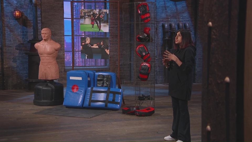 An image of Gulshen stood with the kit from Strike Back Self Defence